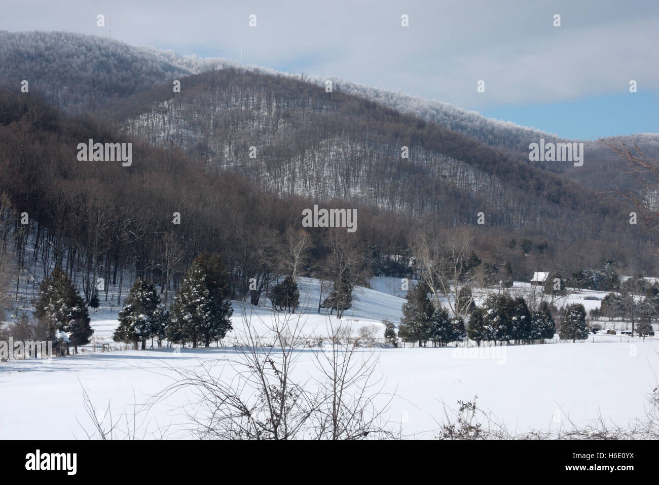 Winter in Virginia's Blue Ride Mountains, with farm in the landscape ...