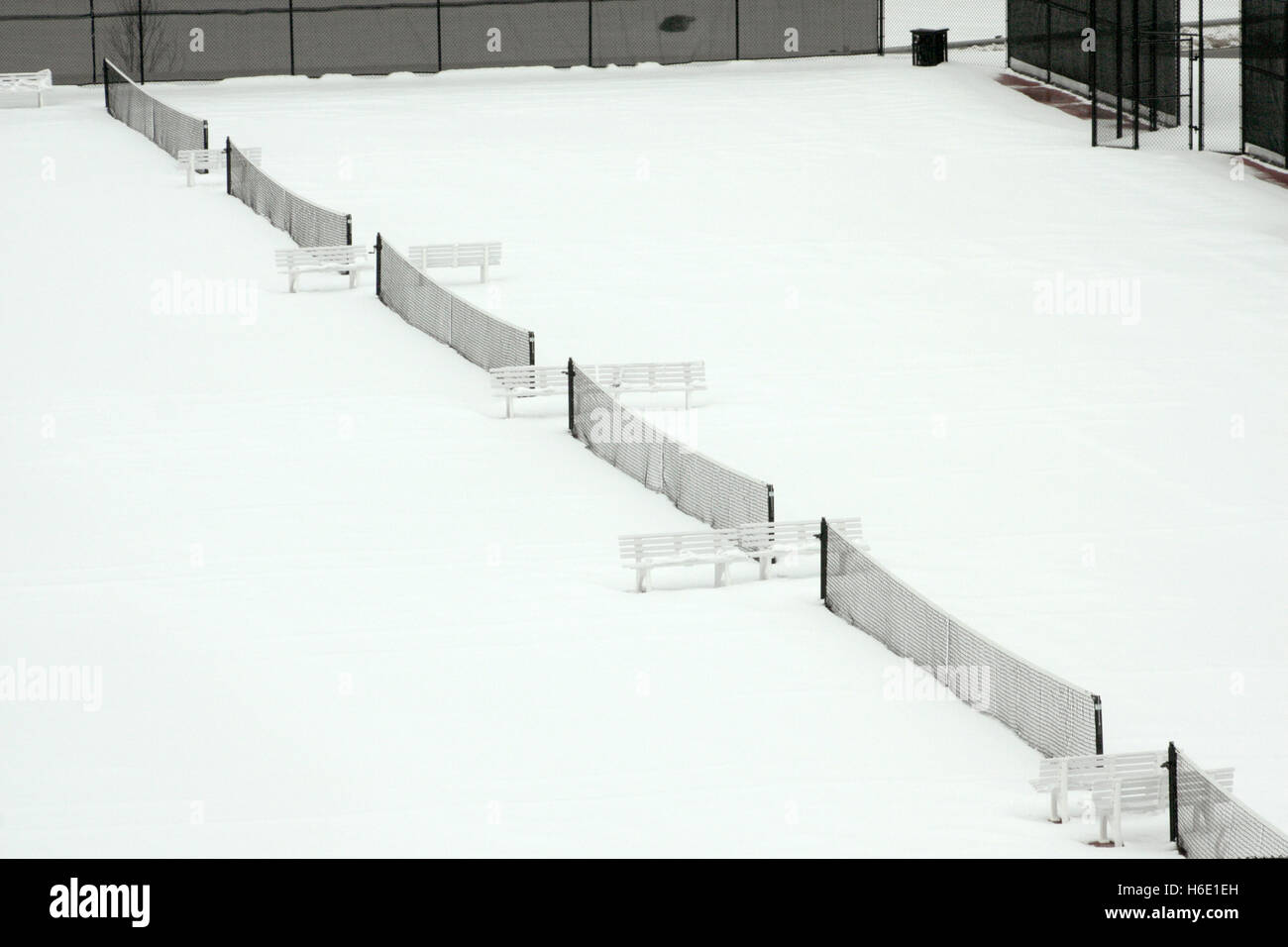 Tennis court covered in snow Stock Photo - Alamy