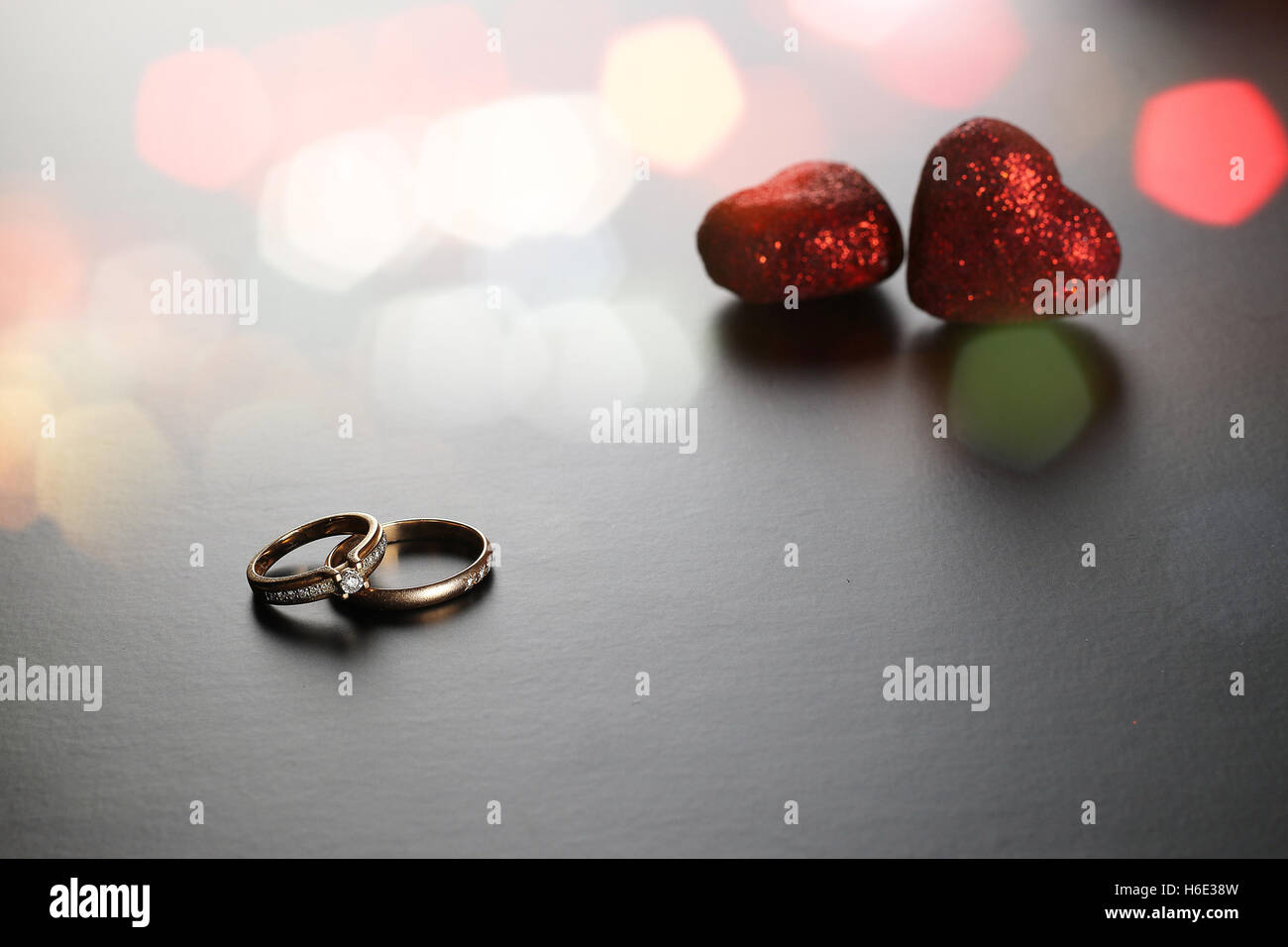 Wedding rings ribbon Stock Photo - Alamy