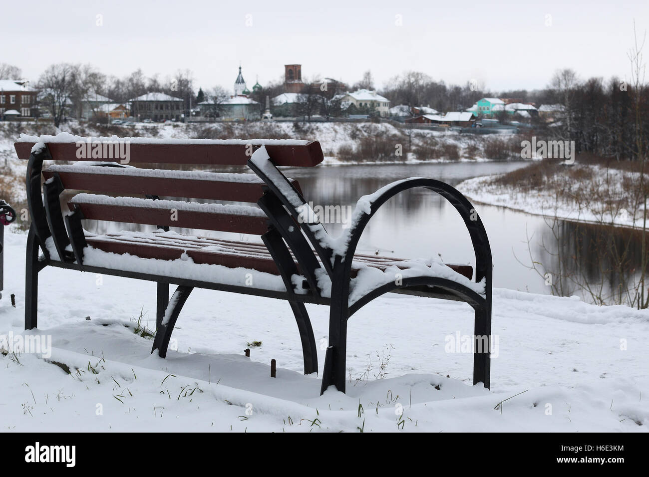 Winter bench in a park Stock Photo - Alamy