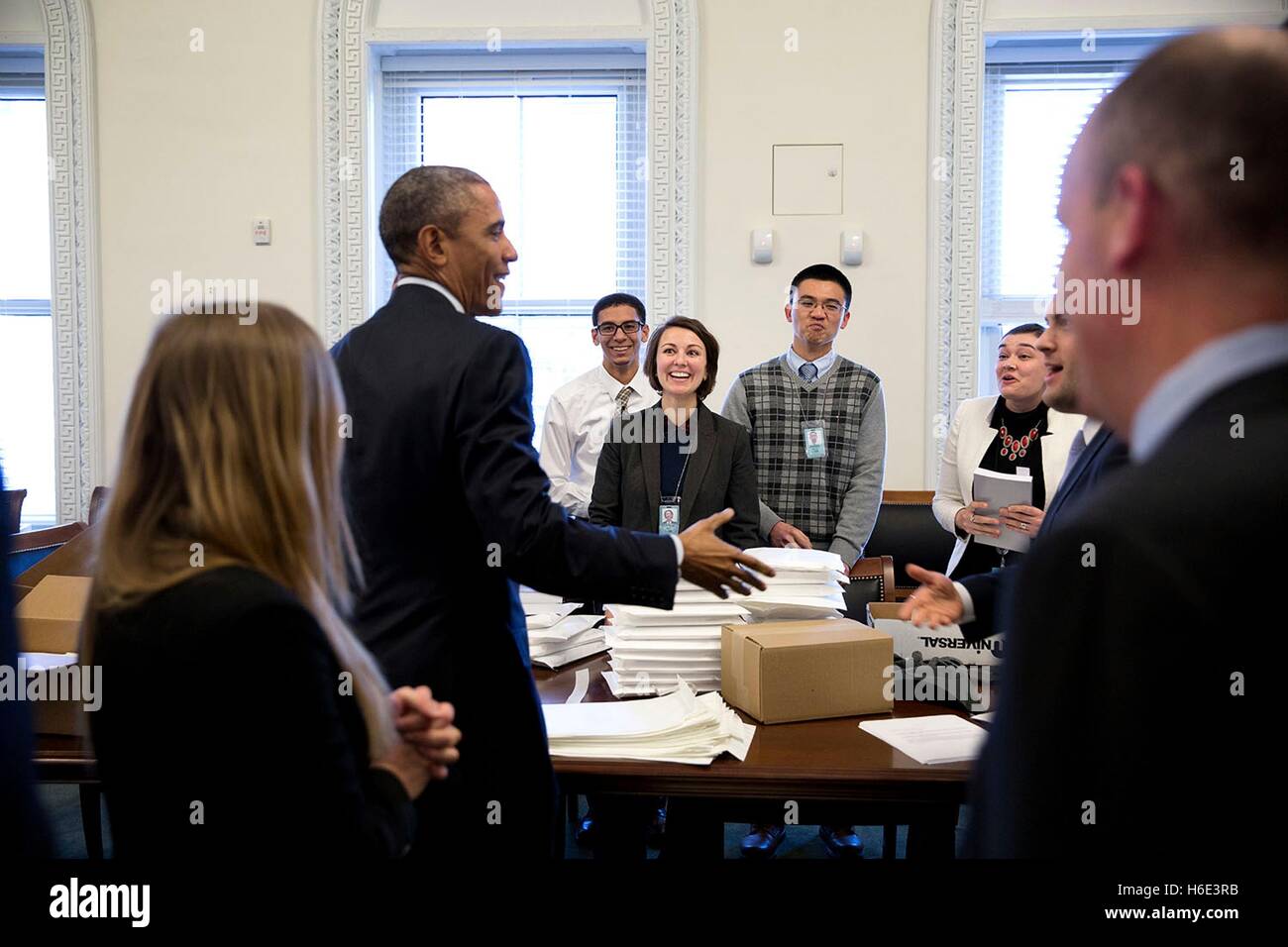 U.S. President Barack Obama greets staff and interns in the White House ...