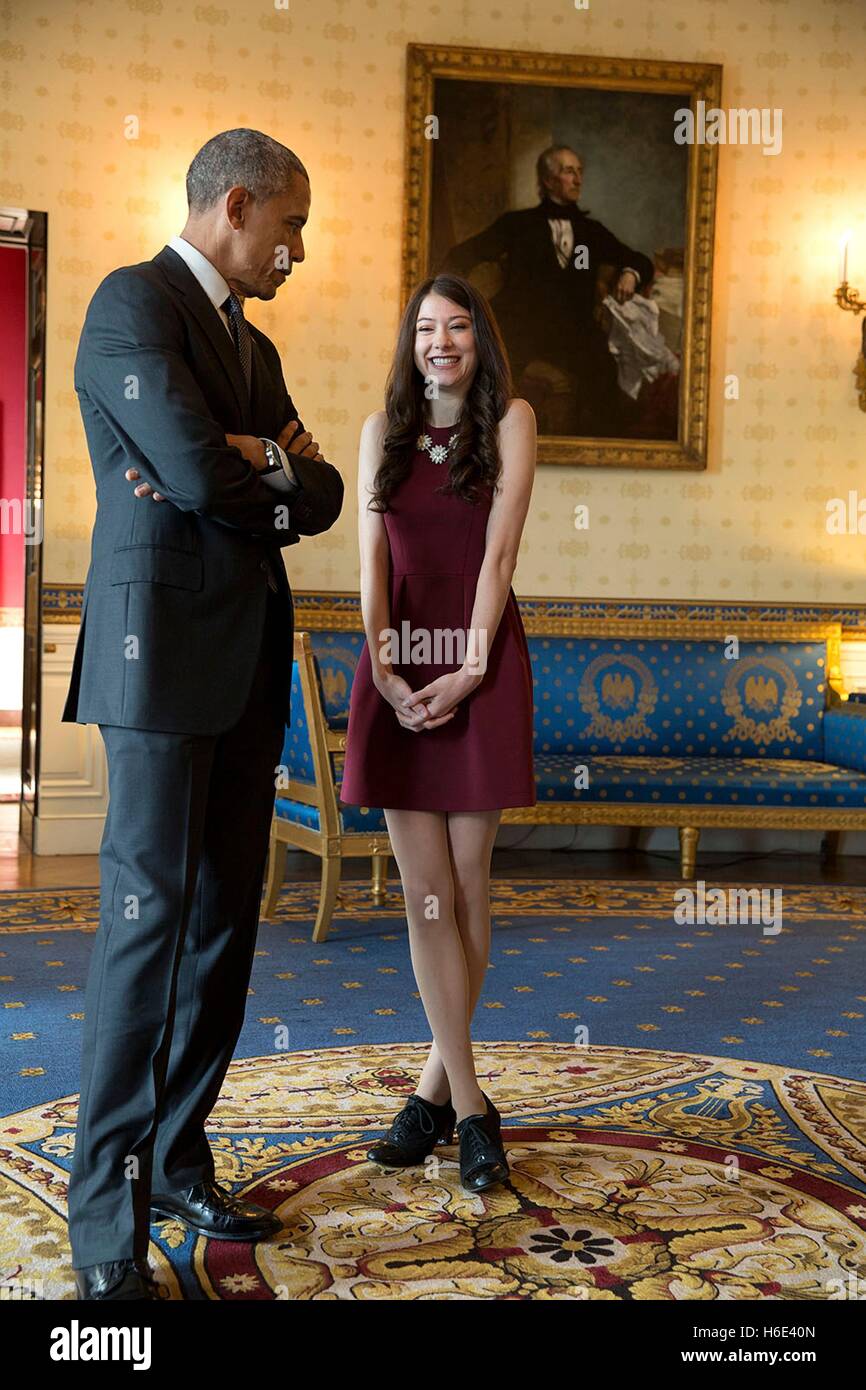 U.S. President Barack Obama talks with Harvard student and cancer ...