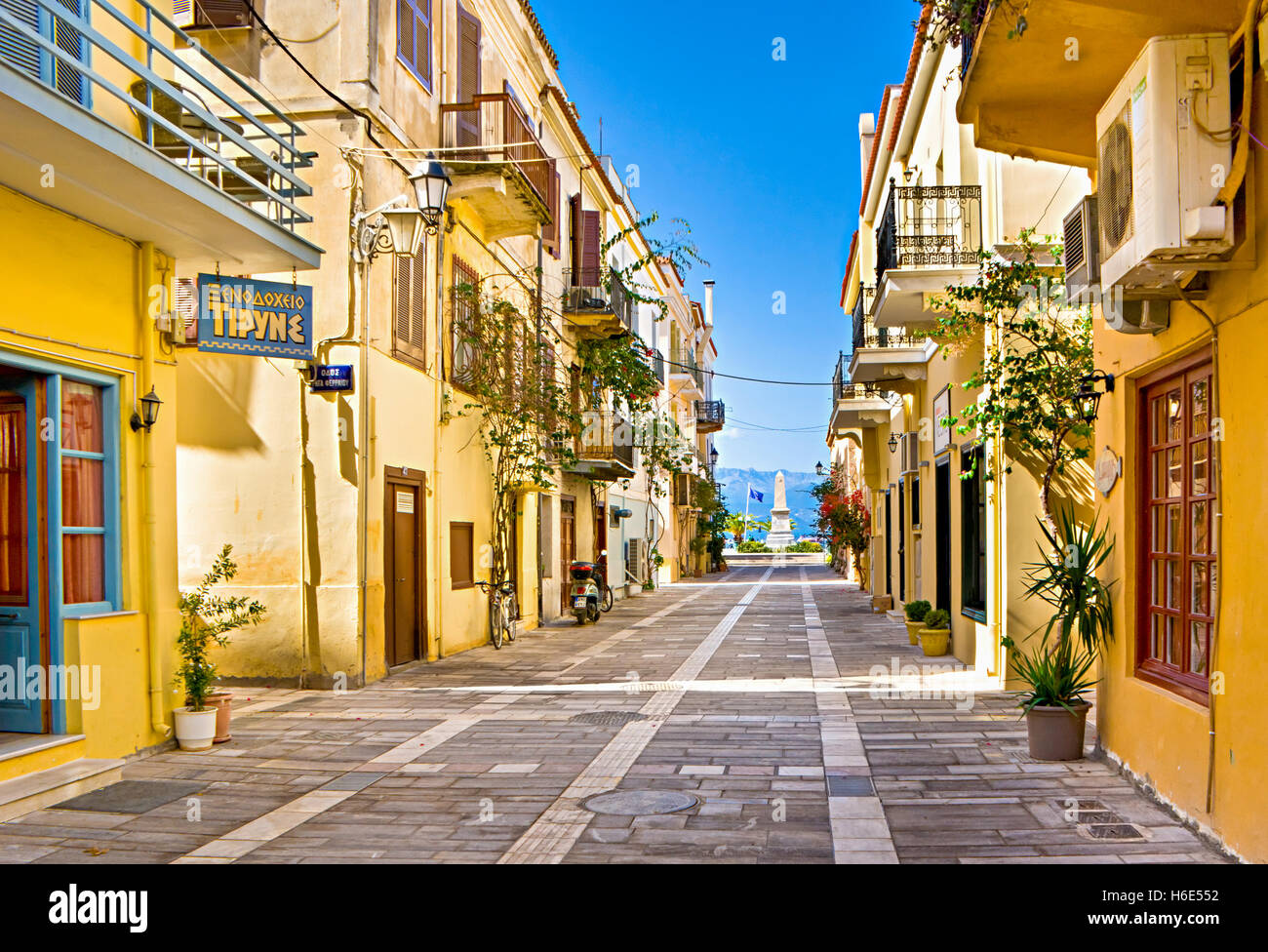 The shady street of the port town leads to the Monument for the Morea ...