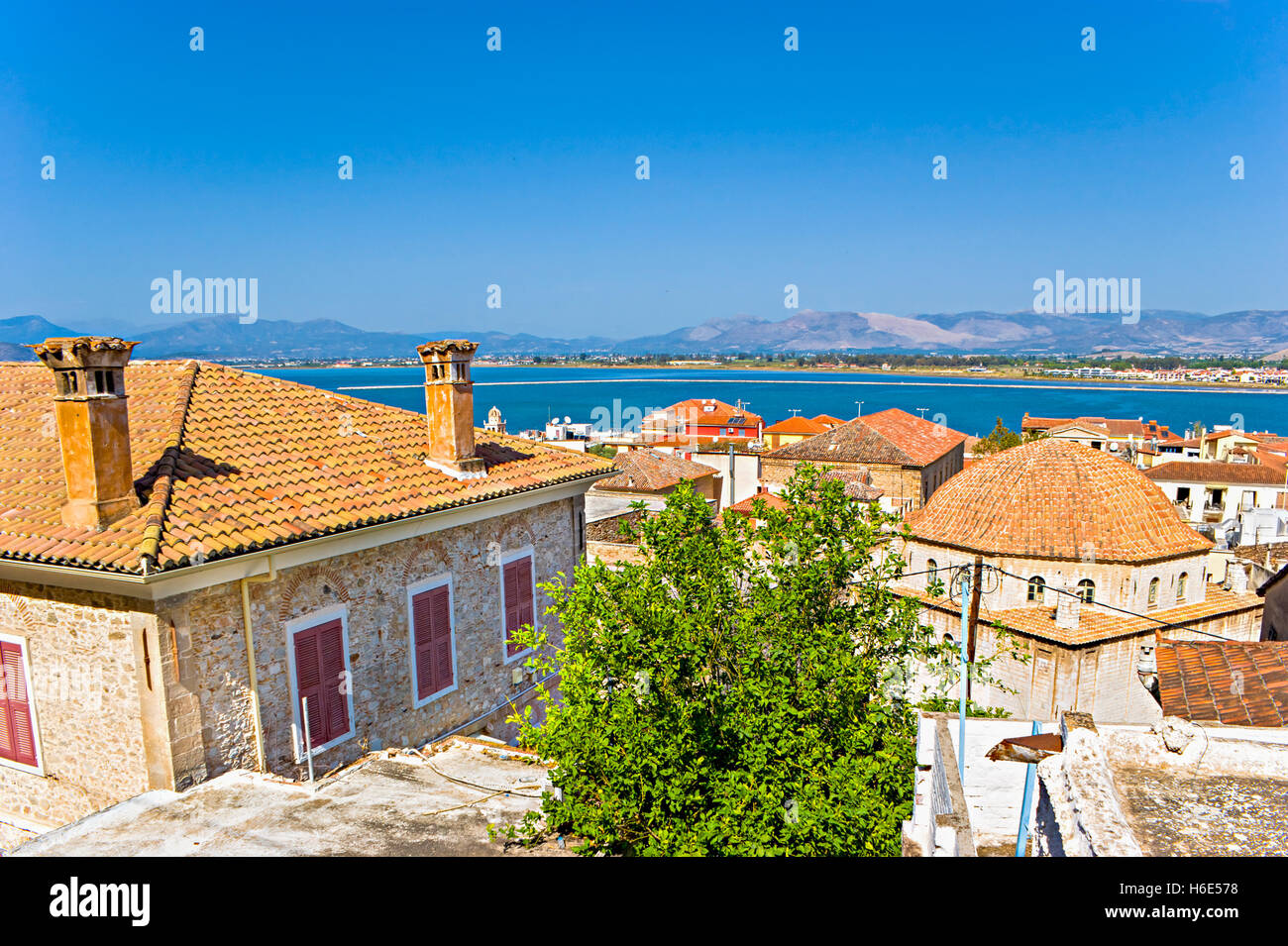 The view from the hill on the old roofs of Nafplio, Argolic Gulf and ...