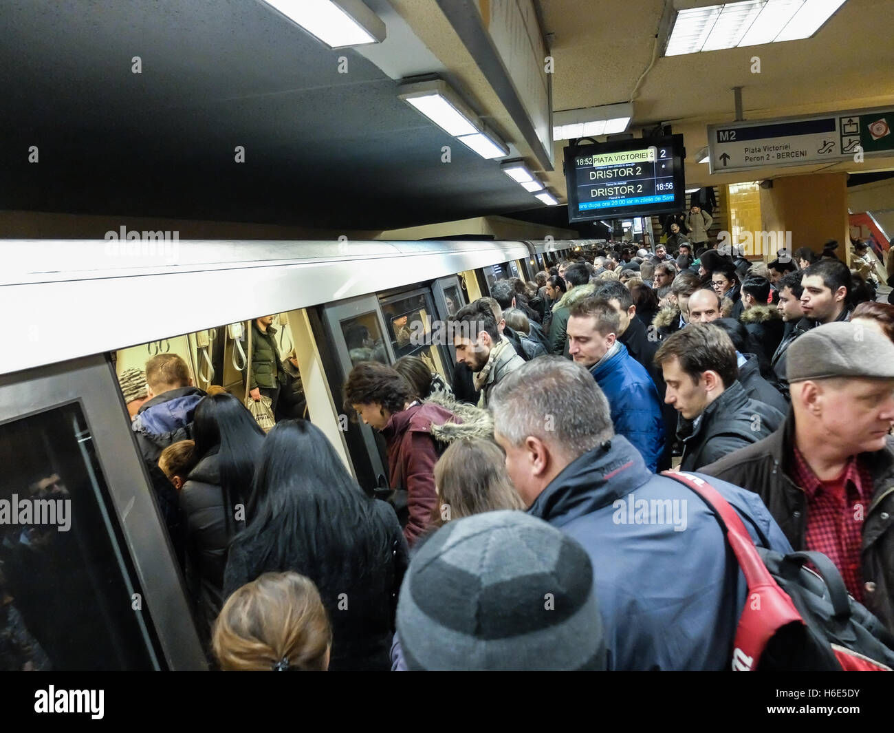 Bucharest, Romania, 1 February 2016: People travel with metro train at ...