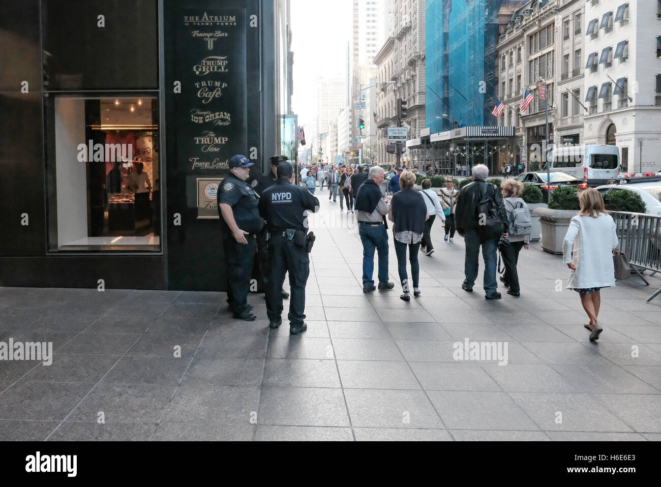 NYPD offices guarding the main entrance to the Trump Tower building in ...