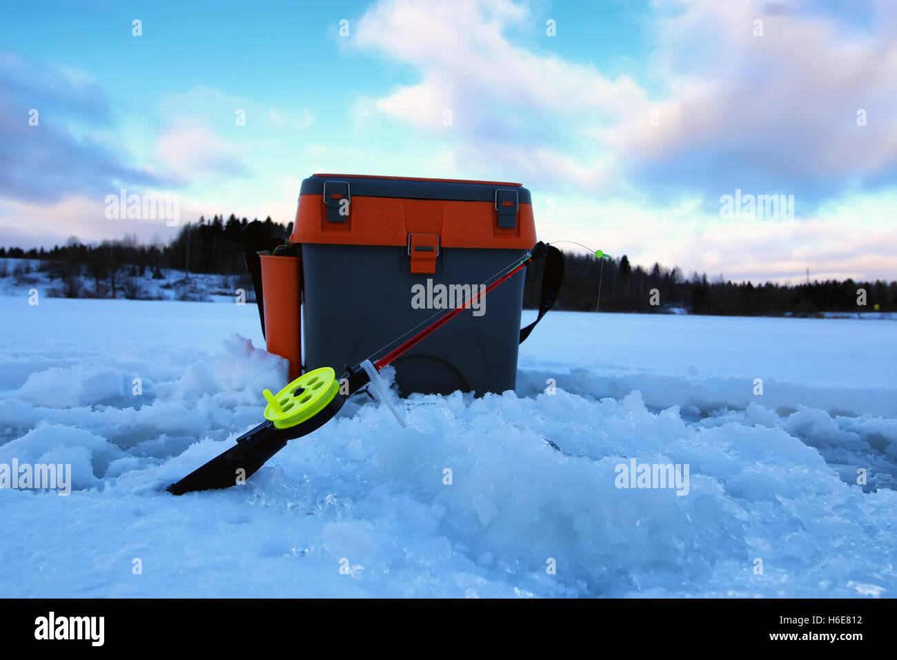 Little winter fishing rod ice Stock Photo - Alamy