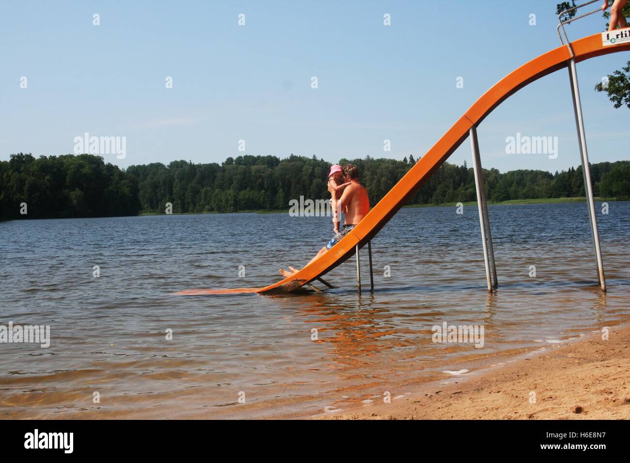 Kids water slide hi-res stock photography and images - Alamy