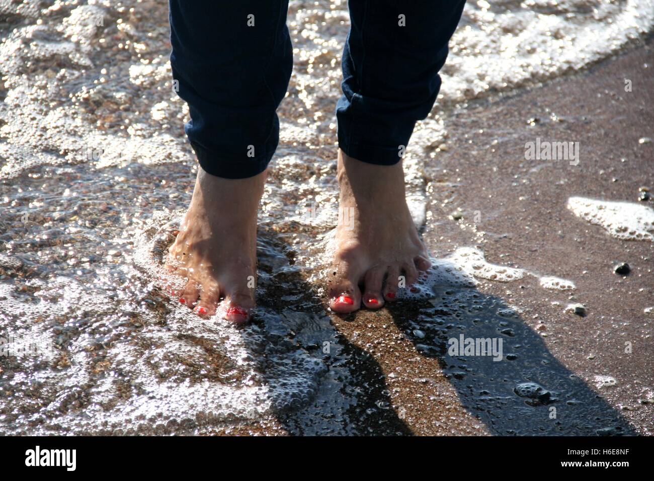 feet in water Stock Photo - Alamy