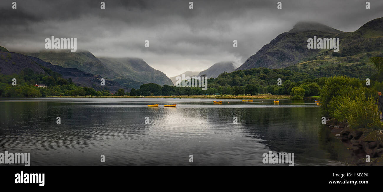 Llyn Padarn lake in Snowdonia under a rainy sky Stock Photo - Alamy