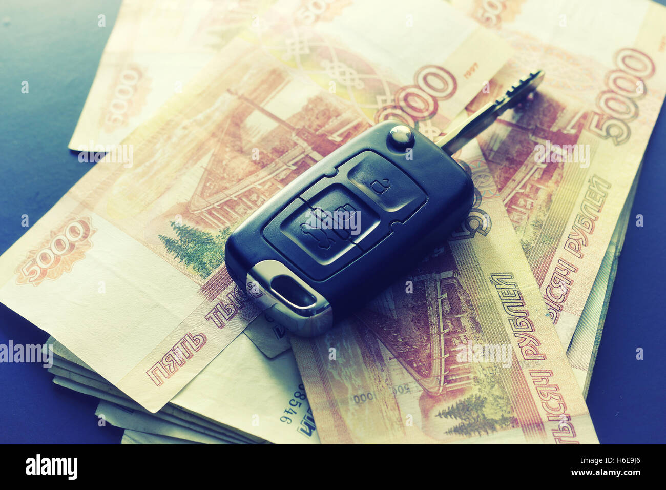 Money key gift Stock Photo - Alamy