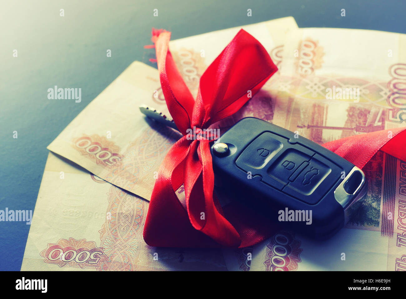 Money key gift Stock Photo - Alamy