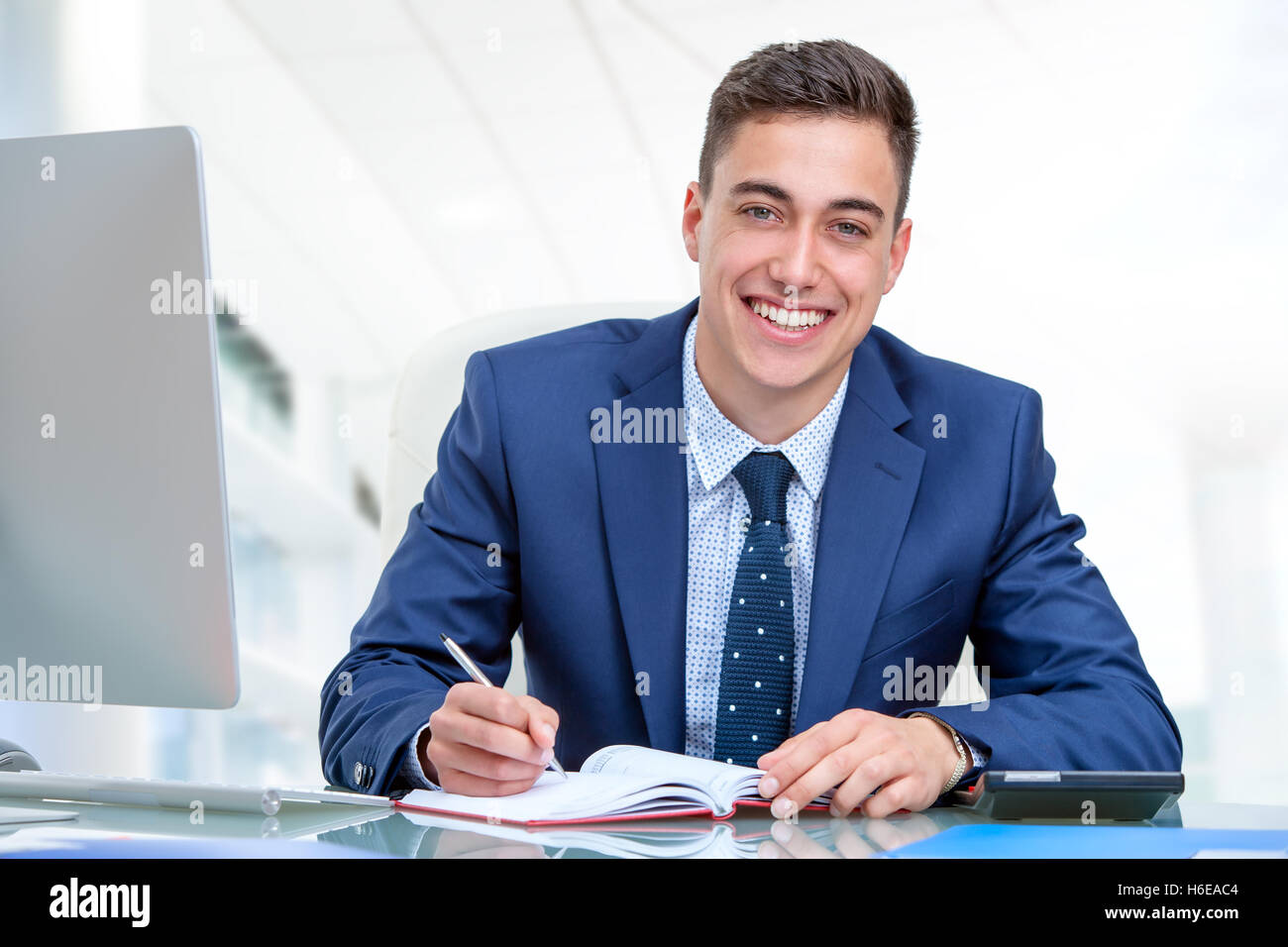 Business man in blue suit hi-res stock photography and images - Alamy