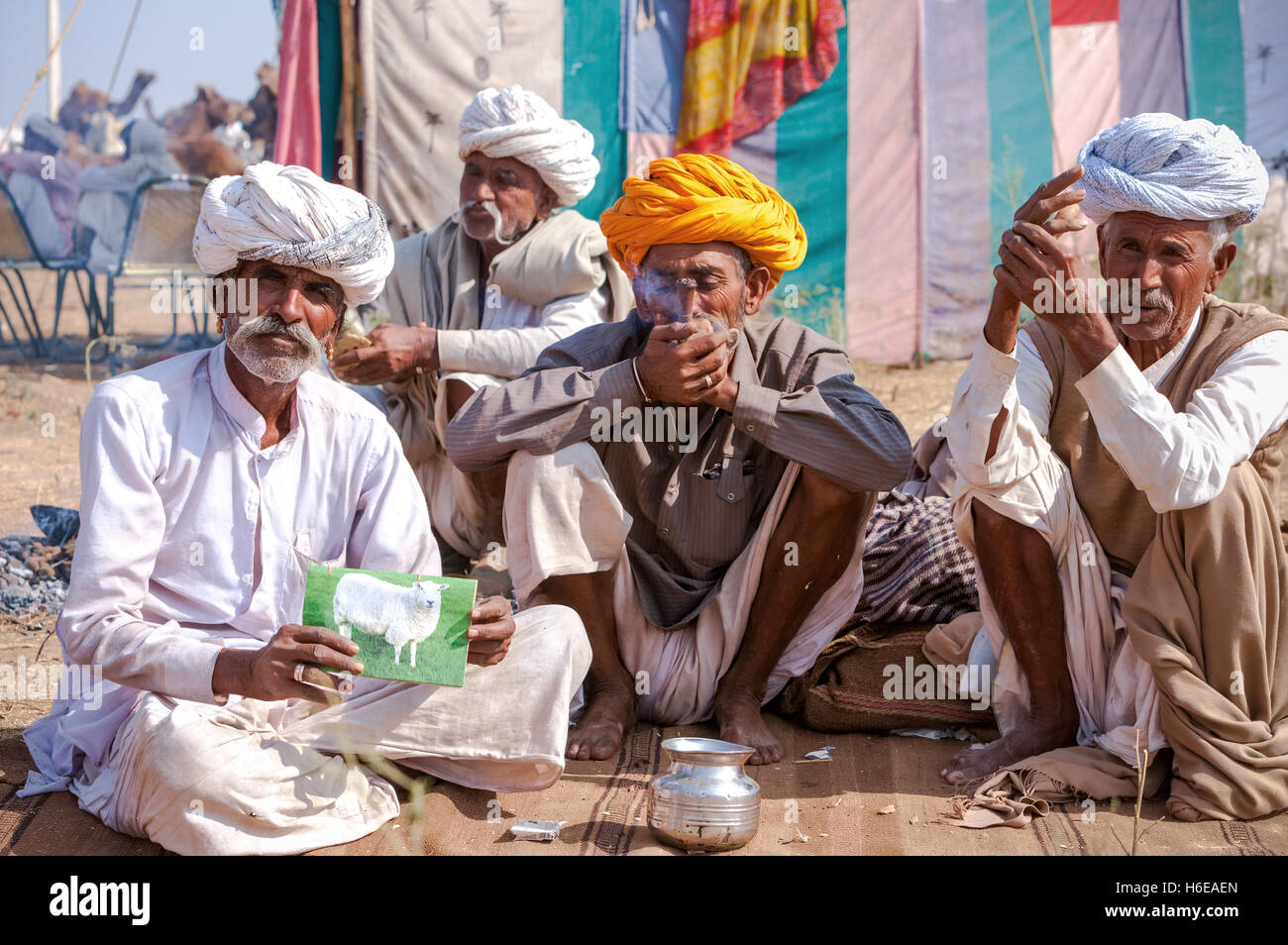 PUSHKAR, INDIA - NOVEMBER 21: An unidentified men attends the Pushkar ...