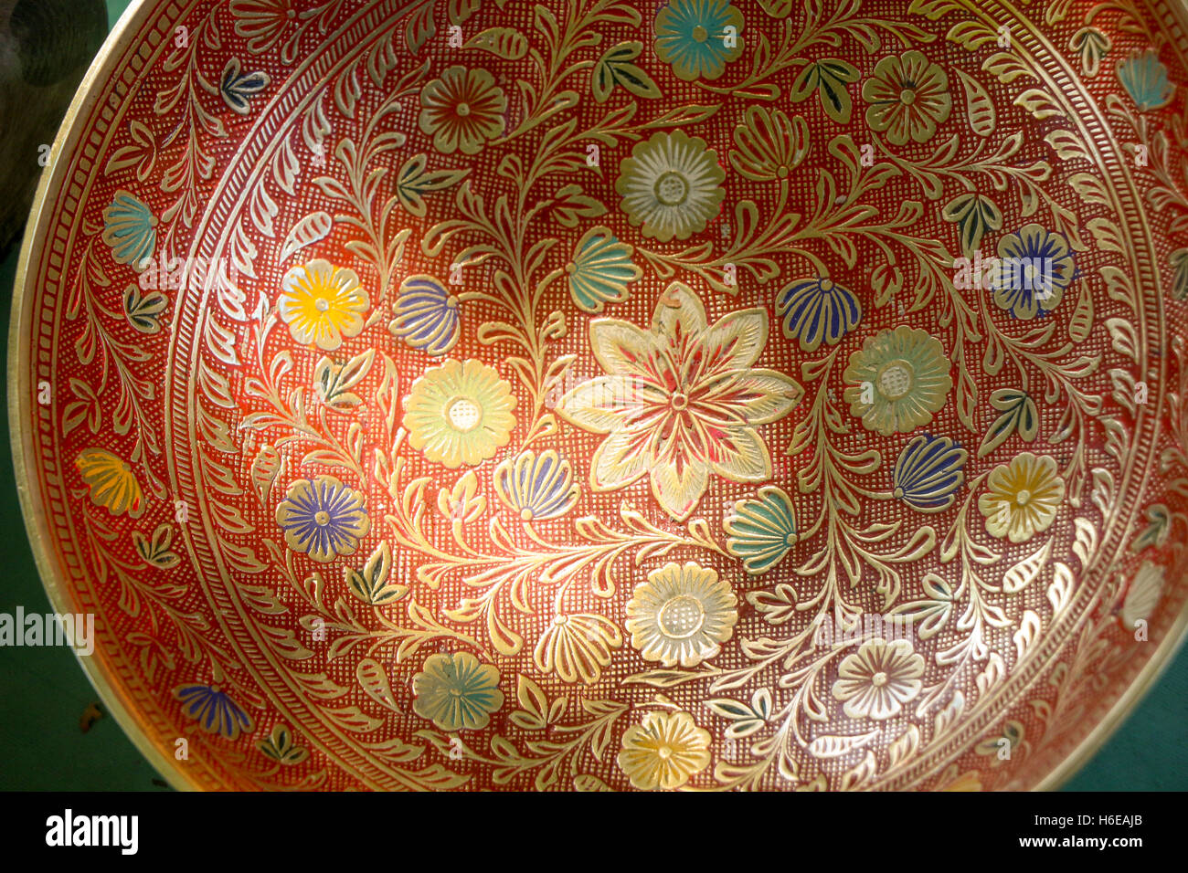 Antique decorative metallic traditional pattern plate Stock Photo - Alamy