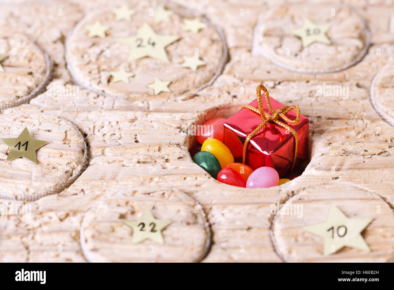 Advent calendar handmade from old timber with open window. Circular ...