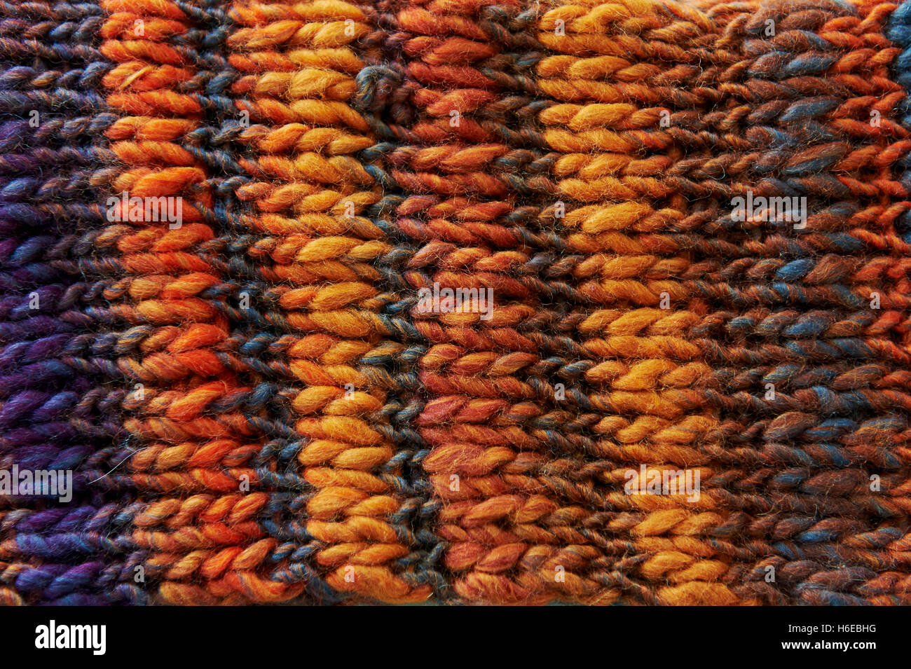Texture wool knitted orange wool, with color transitions of the ...