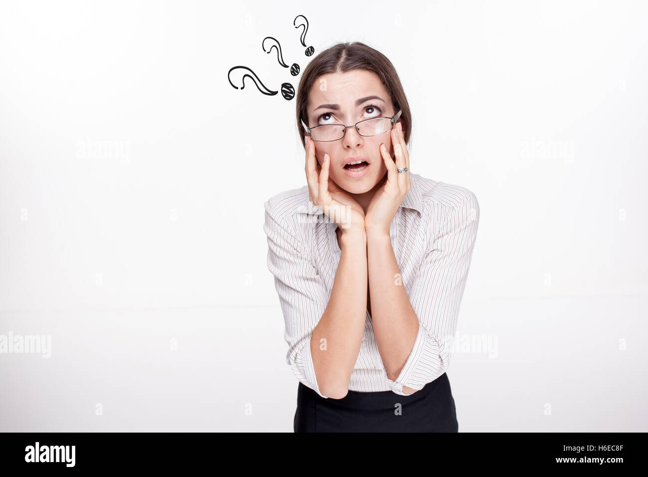 thinking women with question mark on white background Stock Photo - Alamy
