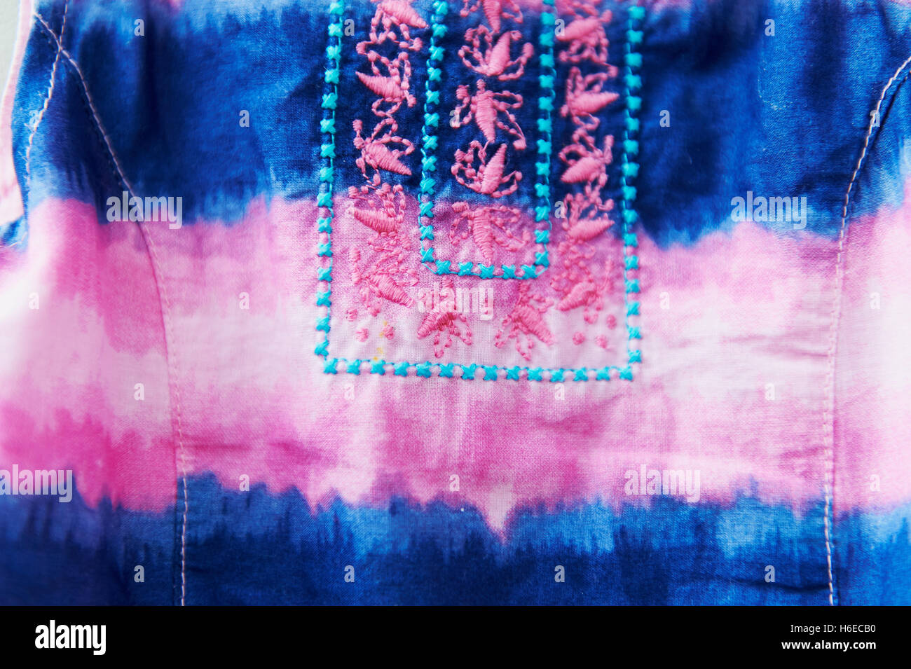 Texture cotton dress with embroidery, dyed pink and blue stripes Stock ...