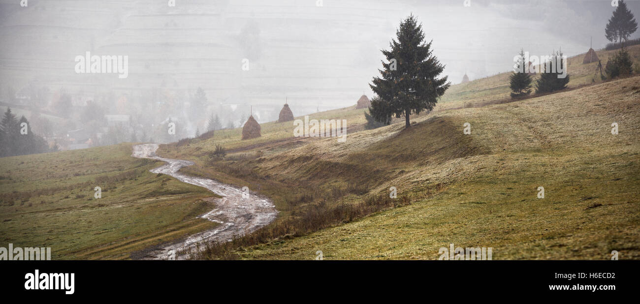 First snow in autumn. Snowfall in mountains. Panorama Stock Photo - Alamy