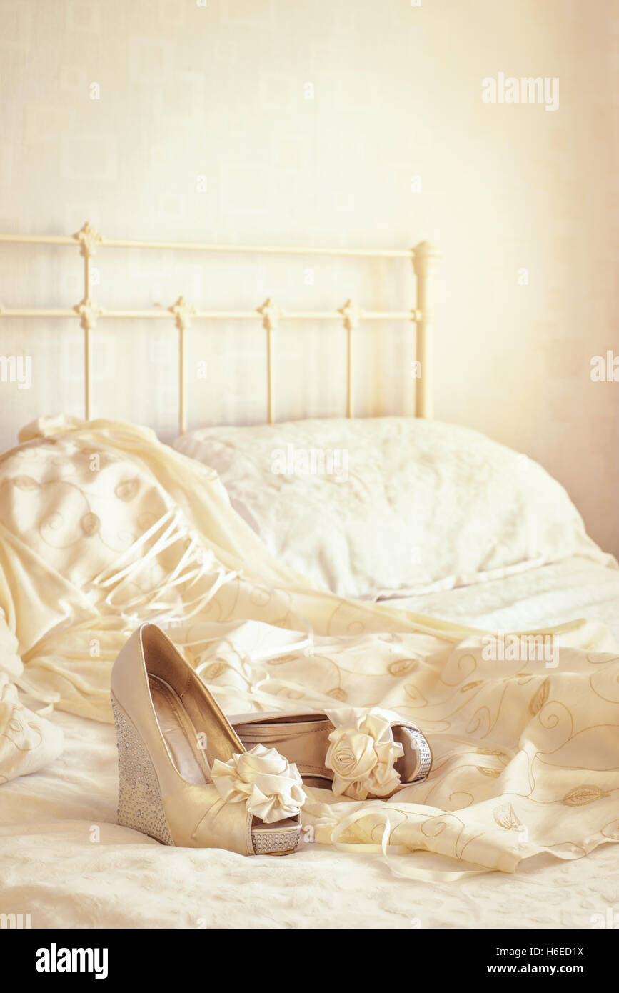 Bride lying on bed hi-res stock photography and images - Alamy
