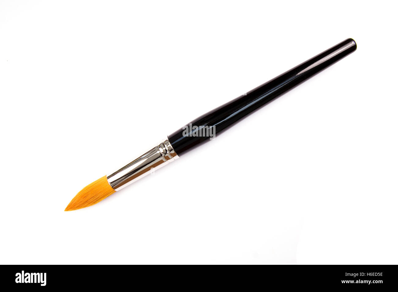 Single artists paint brush on a plain background Stock Photo - Alamy
