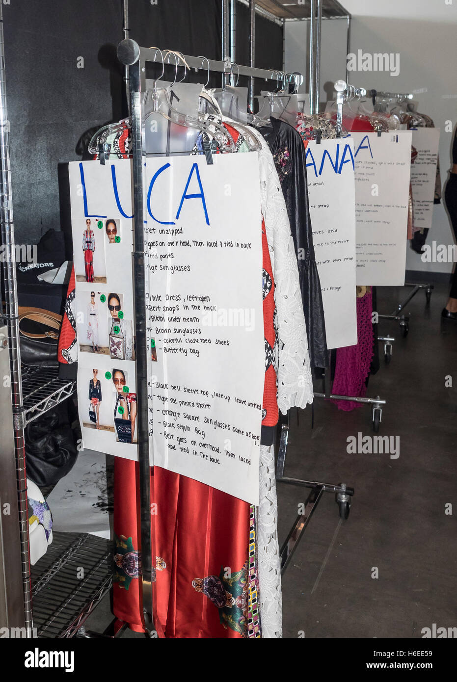 New York, NY, USA - September 11, 2016: Racks with clothes on backstage ...