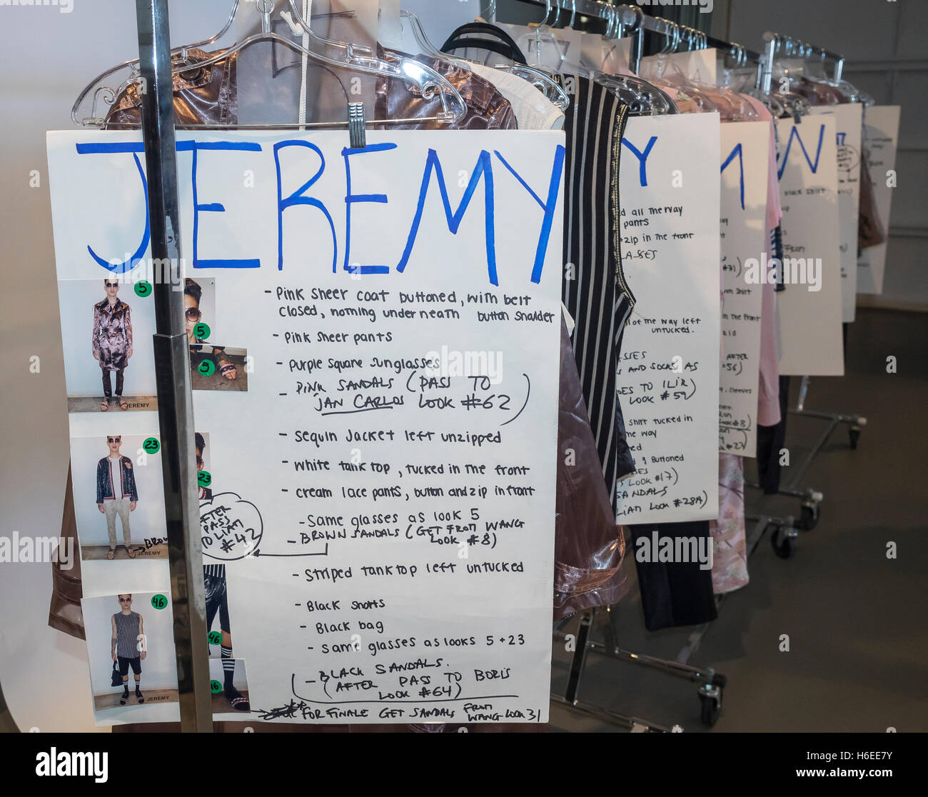 New York, NY, USA - September 11, 2016: Racks with clothes on backstage ...