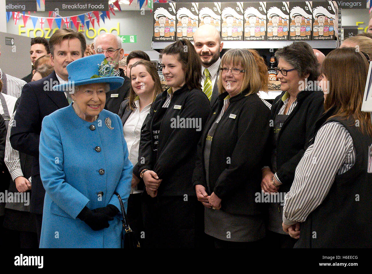 Queen Elizabeth II meets staff at a Waitrose supermarket during a visit ...