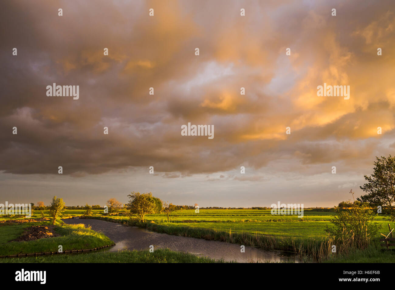 In the flat lands of the Netherlands, a storm comes up during the ...