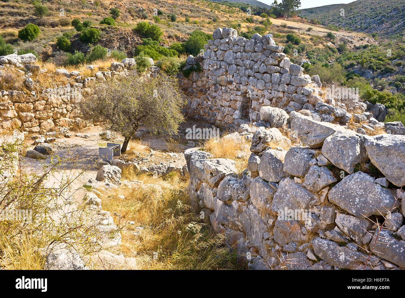 The ruins of the residential buildings in archaeological site of ...