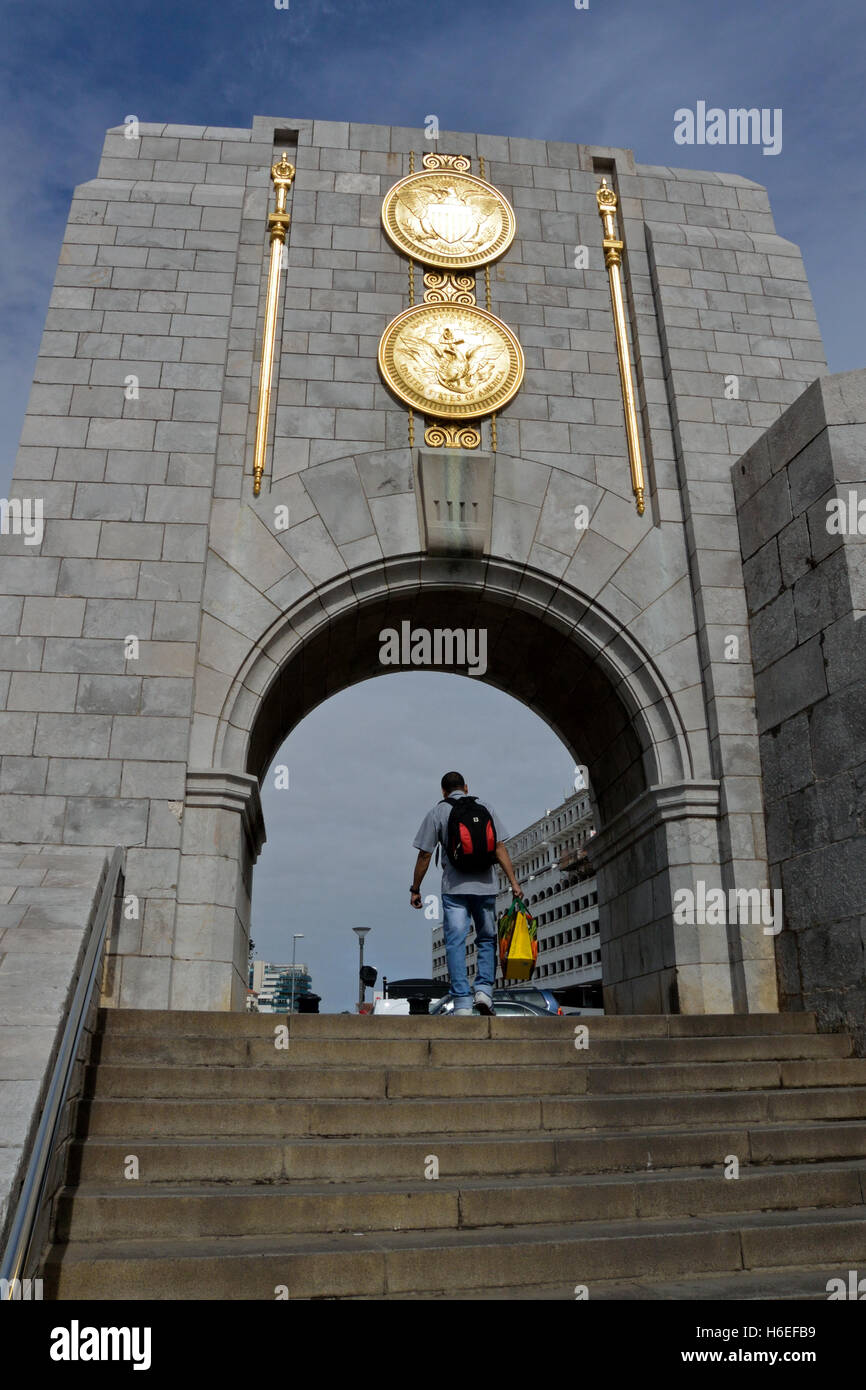 A man walks up the steps and beneath the American war memorial on Line ...