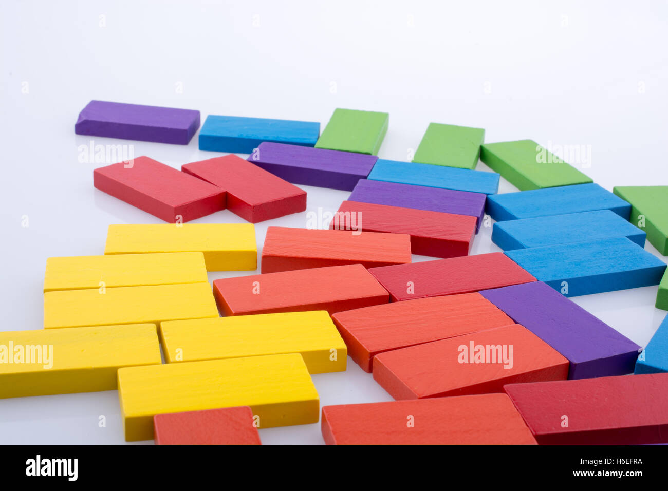 Colorful Domino Blocks on a white background Stock Photo - Alamy