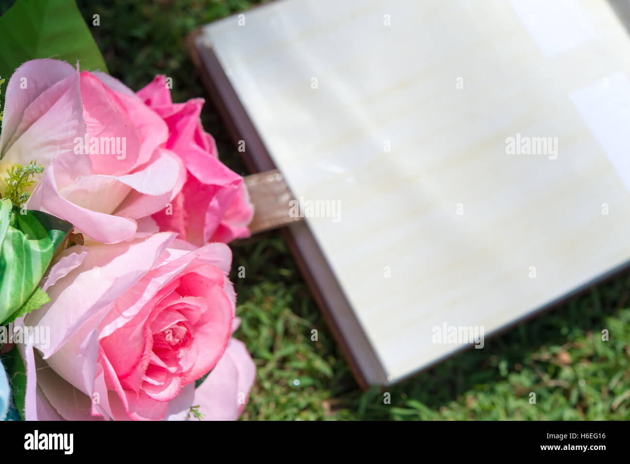 bouquet of flowers with blank page notebook Stock Photo - Alamy