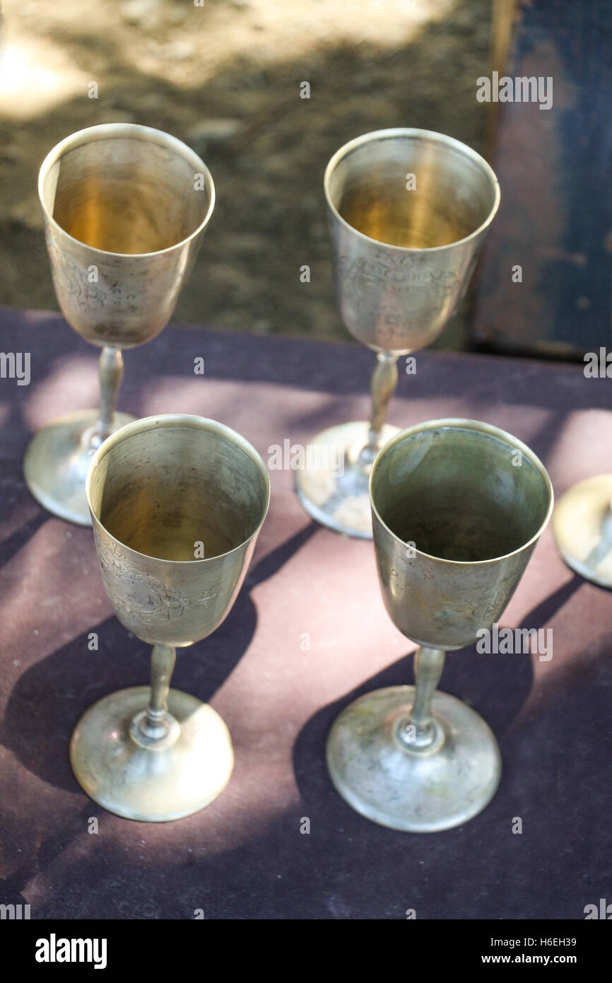 Drinking glasses made of metal of various color Stock Photo - Alamy