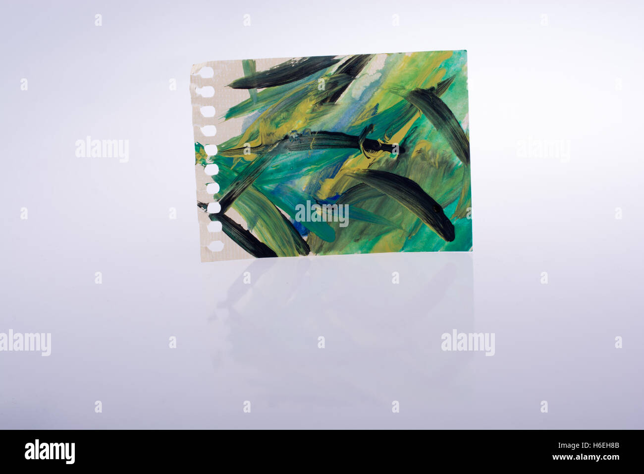 Painted torn note paper on white background Stock Photo - Alamy