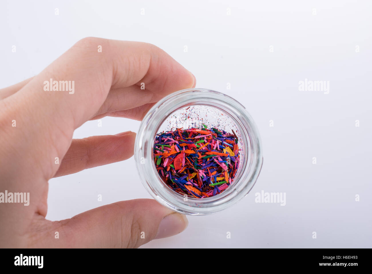 Little perfume glass bottle in hand on a white background Stock Photo ...