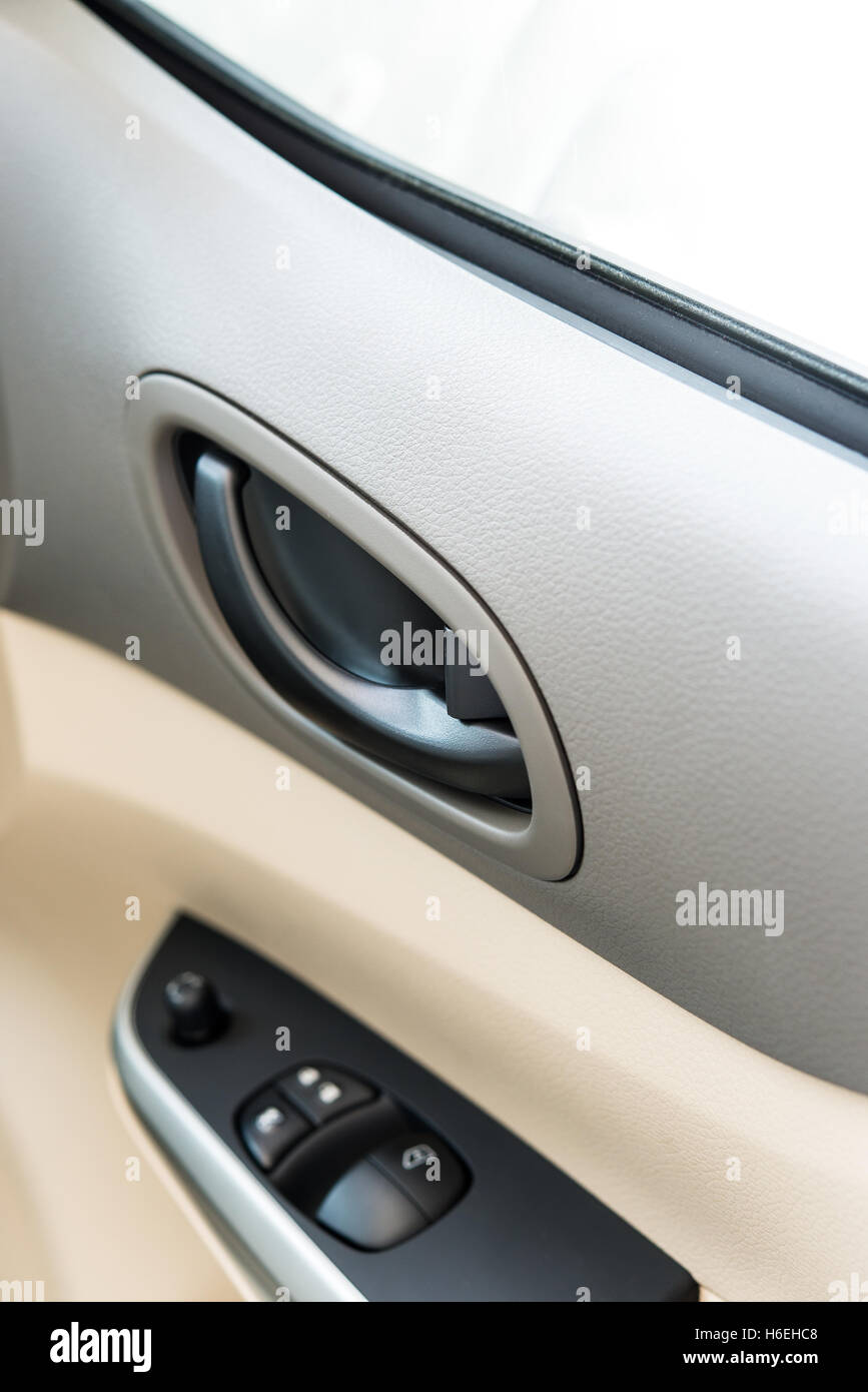 close-up knob of doors interior of modern car Stock Photo - Alamy