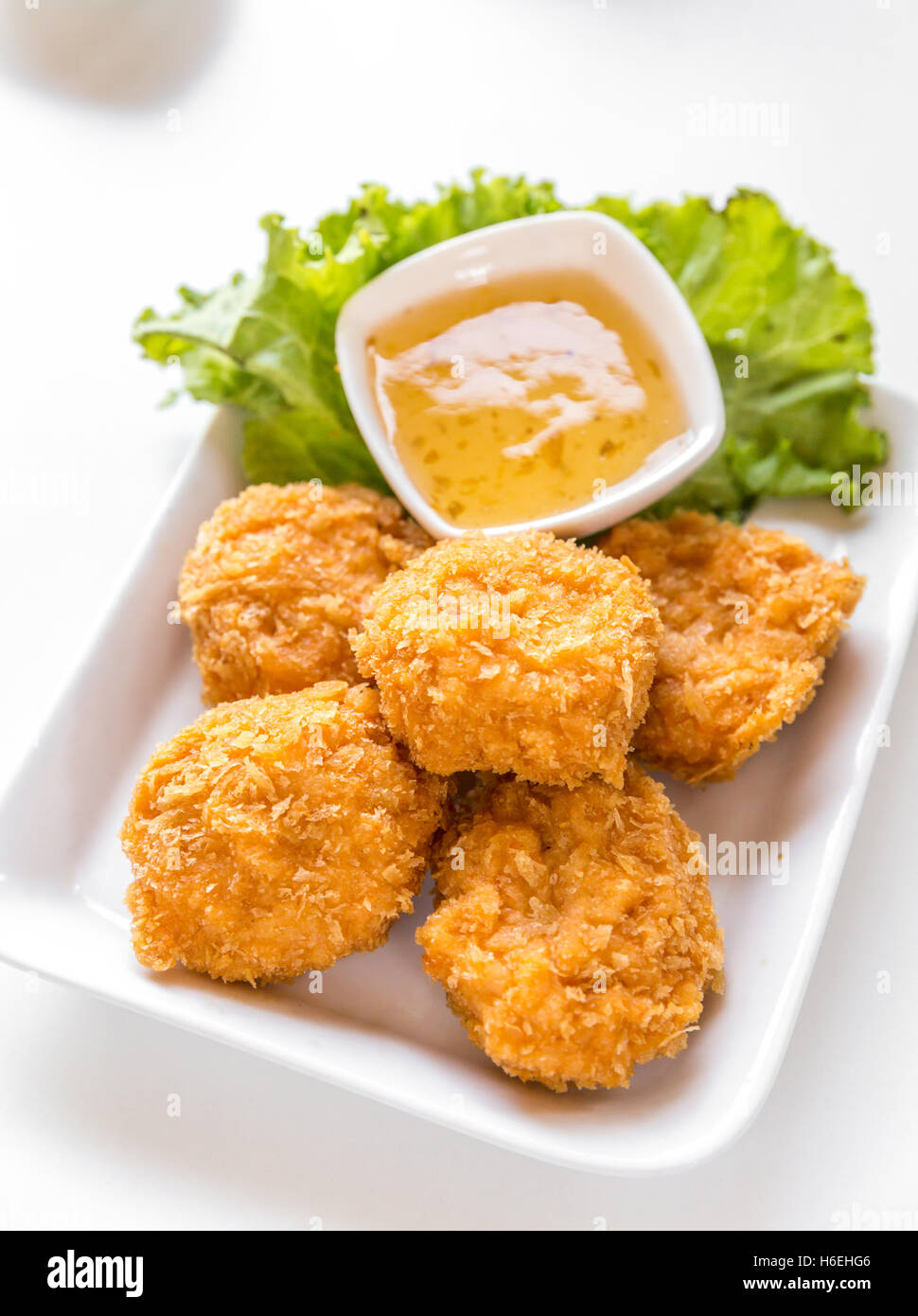 deep-fried shrimp cakes with sweet sauce on white background Stock ...