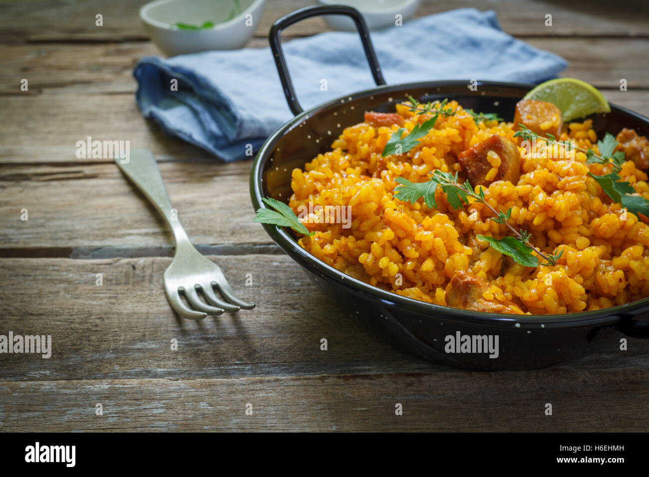 traditional spanish paella rice with chichen and meat on pan Stock ...