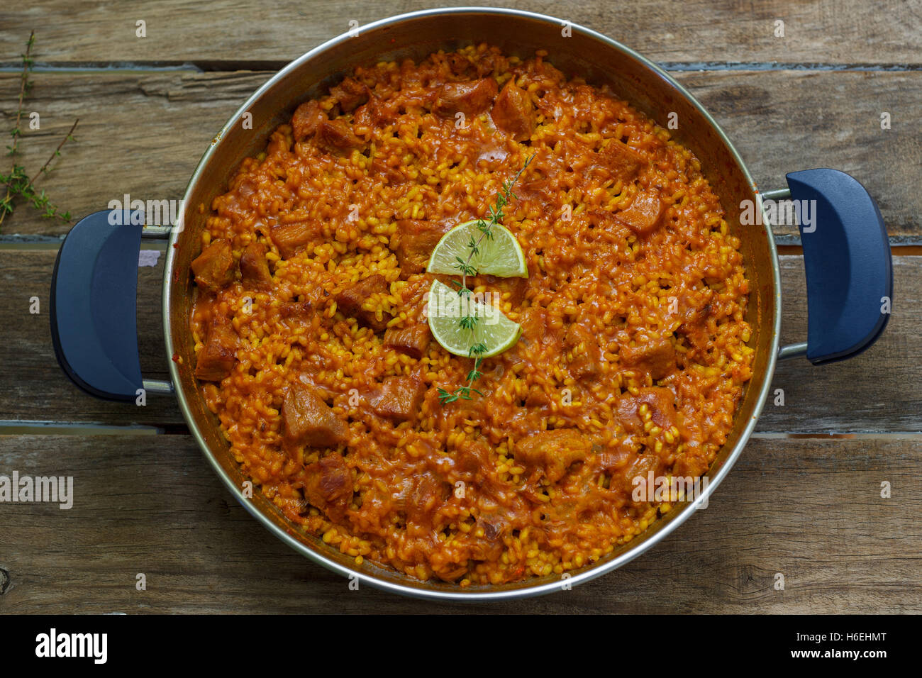 traditional spanish paella rice with chichen and meat on pan Stock ...