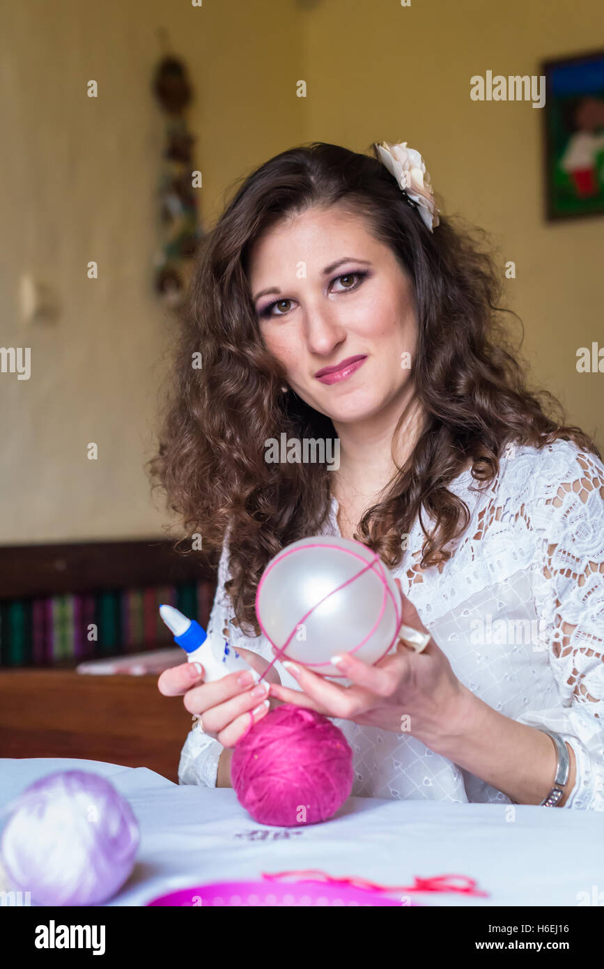 Girl doing decoration balloons Stock Photo - Alamy