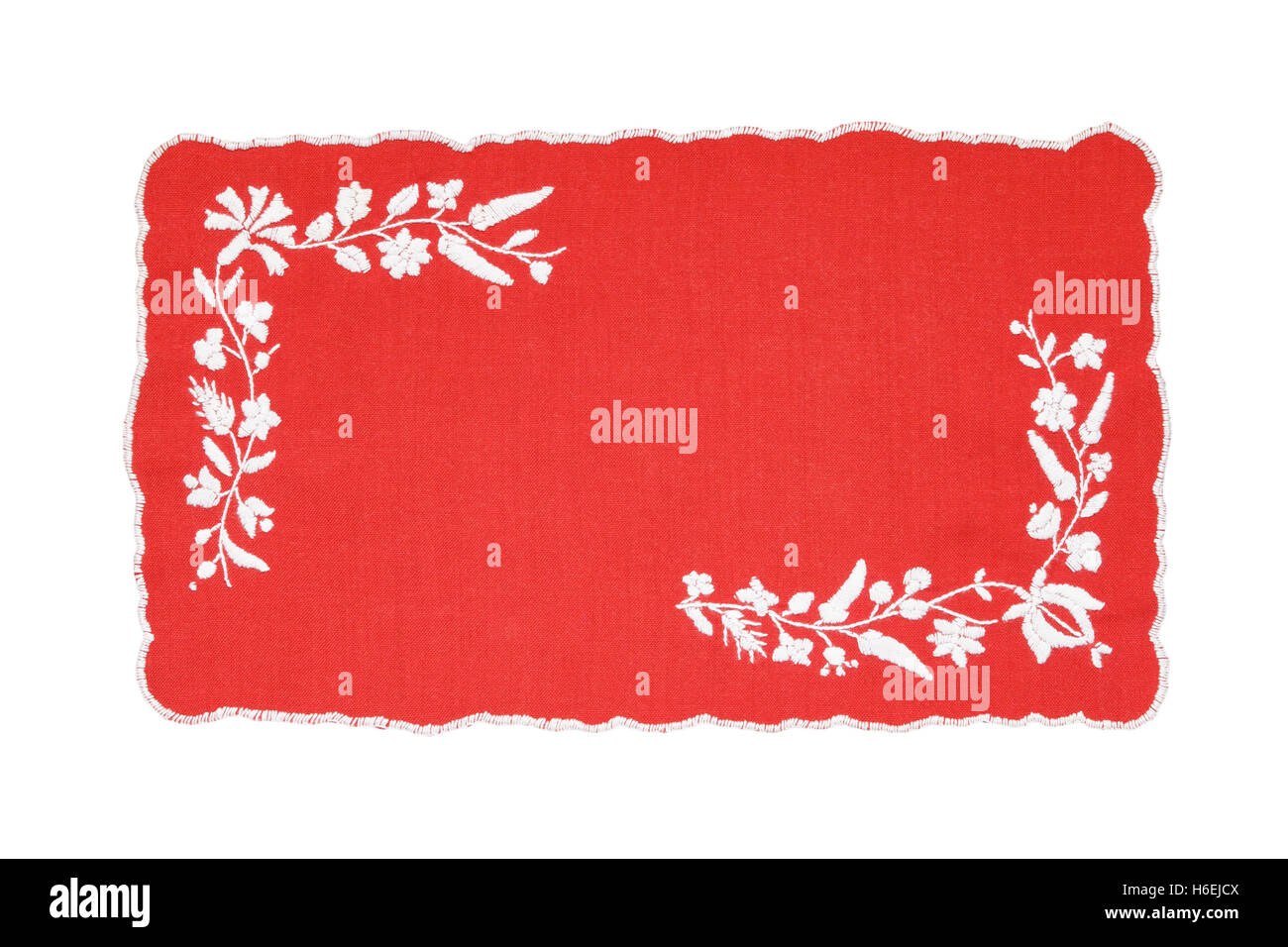 Embroidered red and white tablecloth isolated on white background Stock ...