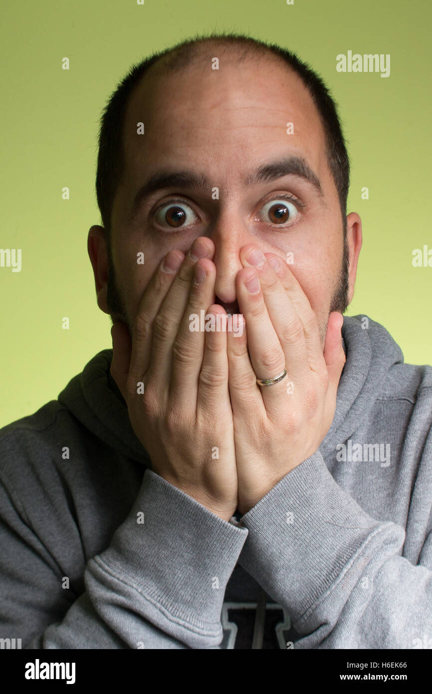 Man with surprised expression on his face Stock Photo - Alamy