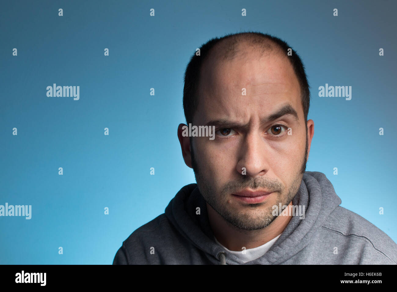 Man with puzzled expression on his face Stock Photo - Alamy