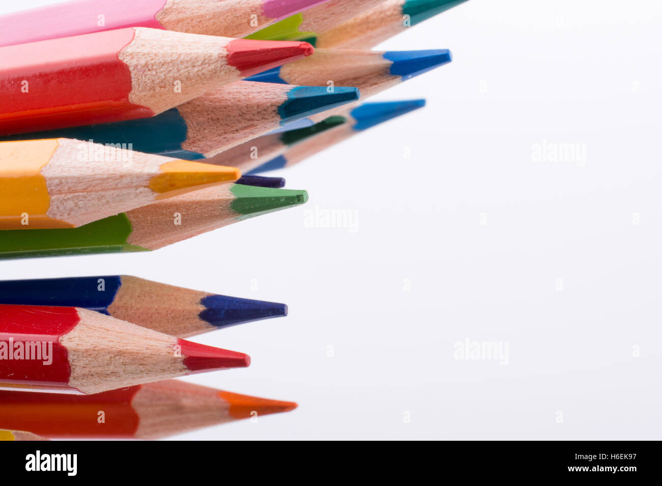 Color Pencils of various colors on a white background Stock Photo - Alamy