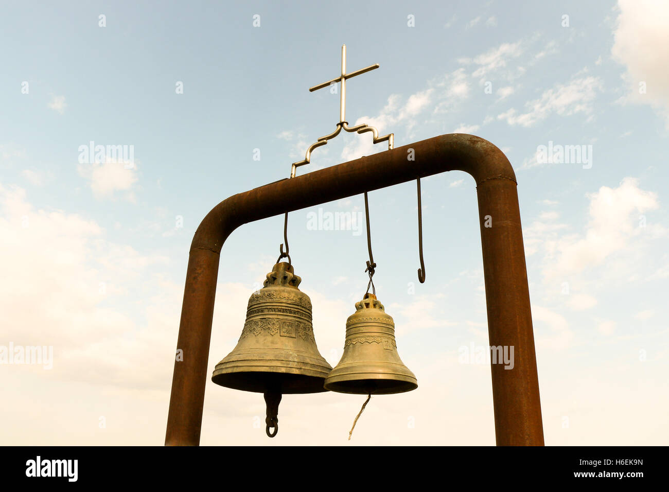 Old twin traditional metal church bells Stock Photo - Alamy