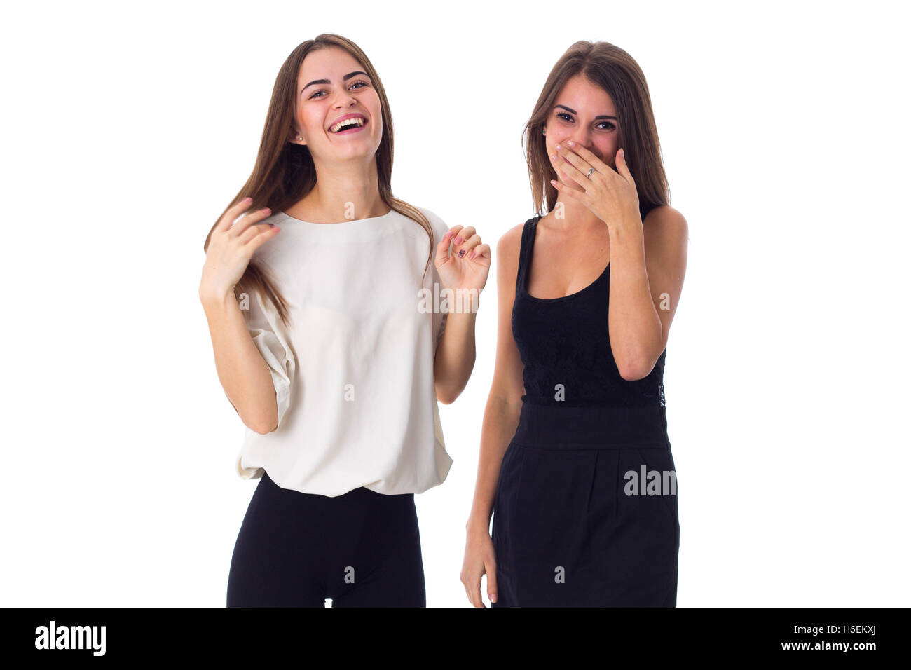 Two young woman laughing Stock Photo - Alamy