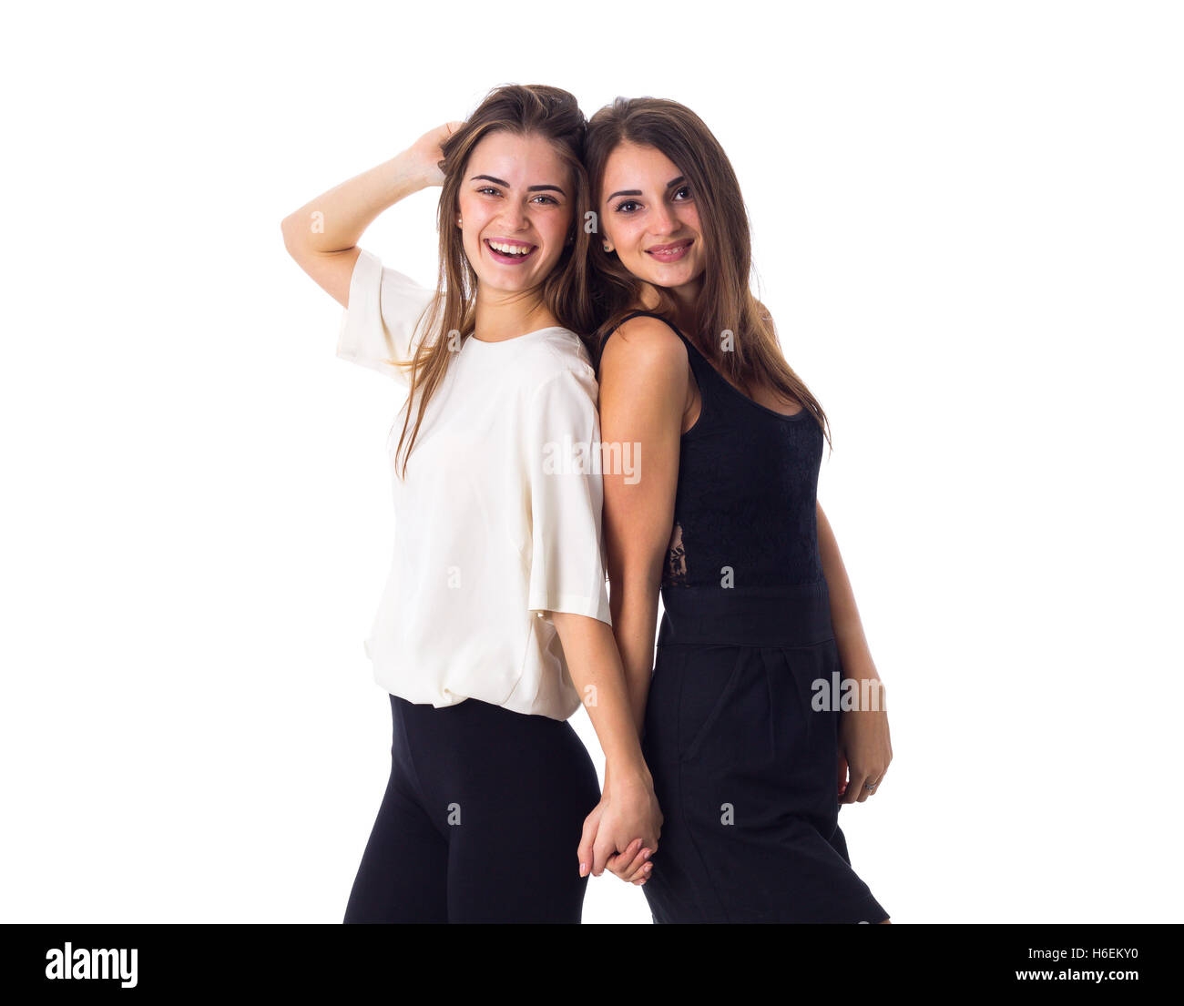 Two young woman holding hands Stock Photo - Alamy Two young woman holding hands Stock Photo - Alamy