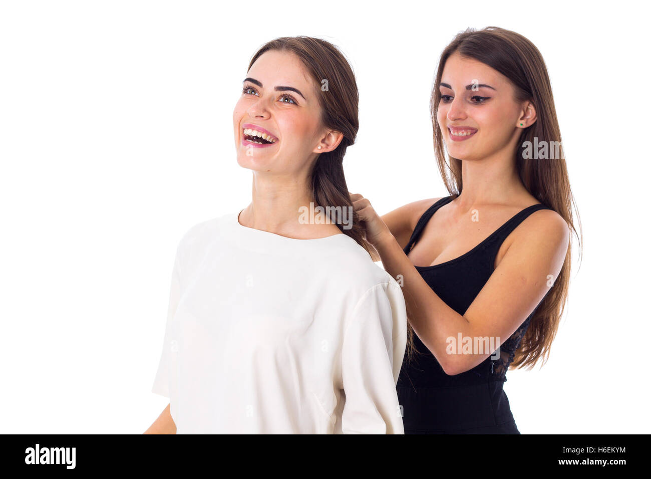 Making hair one another hi-res stock photography and images - Alamy